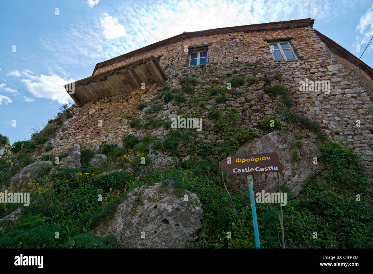 Typical stone houses in Greece against the sky Stock Photo - Alamy