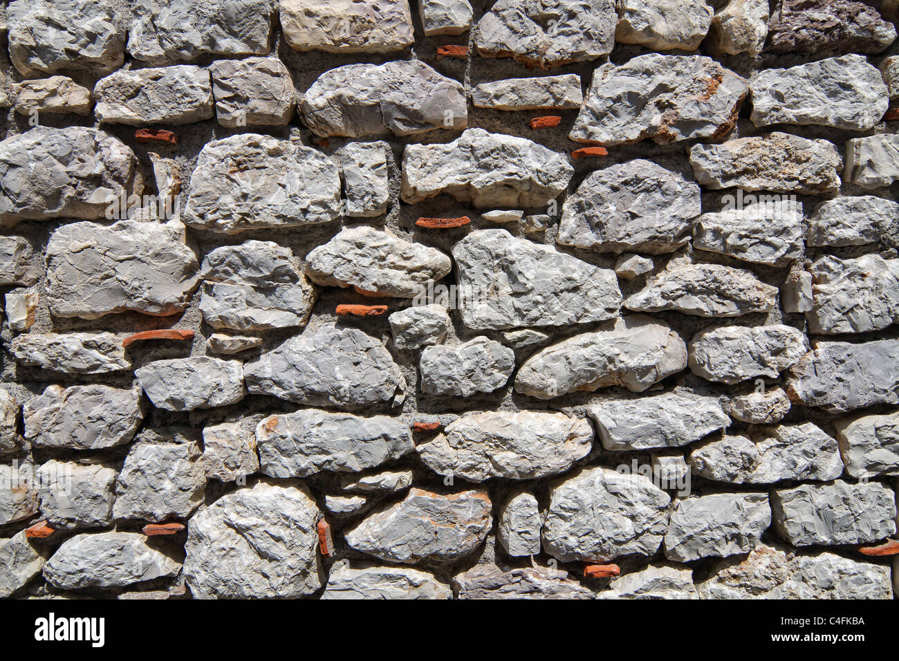 Grey stone textured wall, typical wall of Mani houses Stock Photo - Alamy