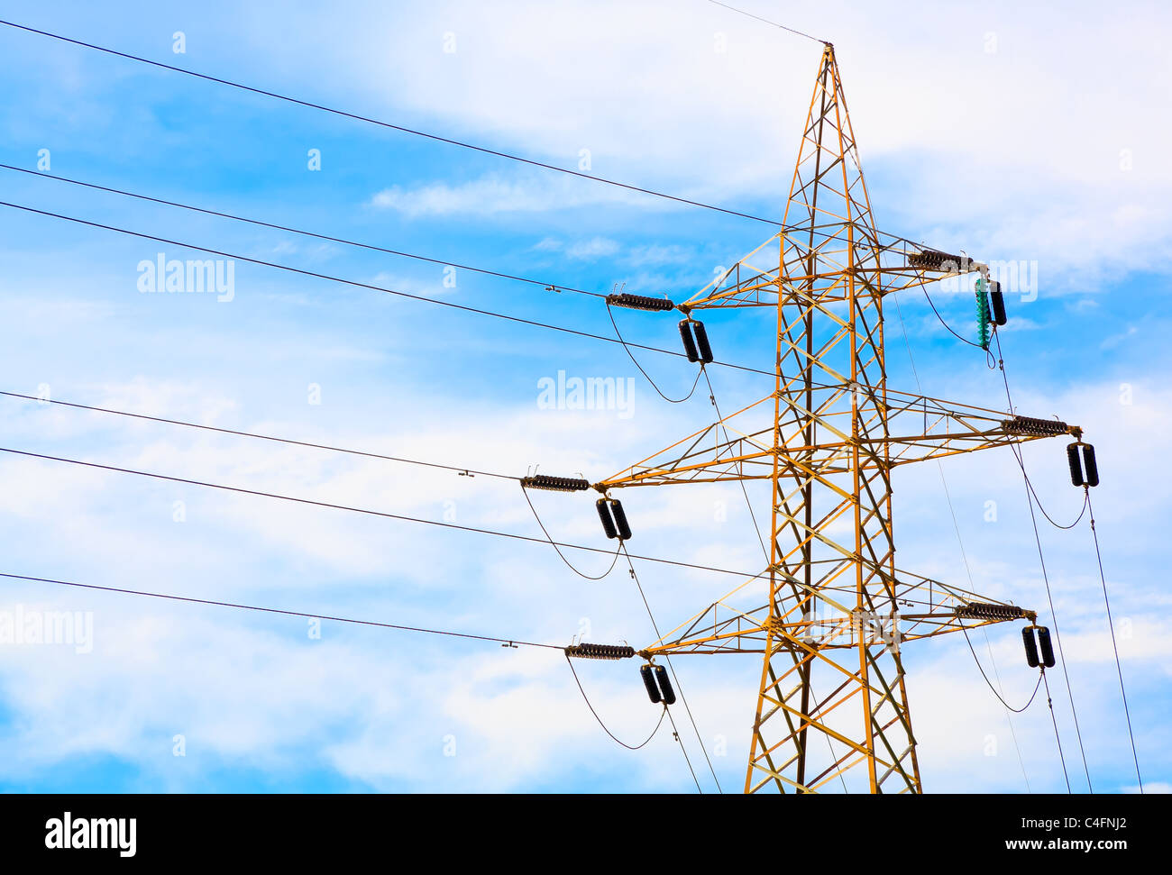 Power line pillar against a cloudy background Stock Photo - Alamy