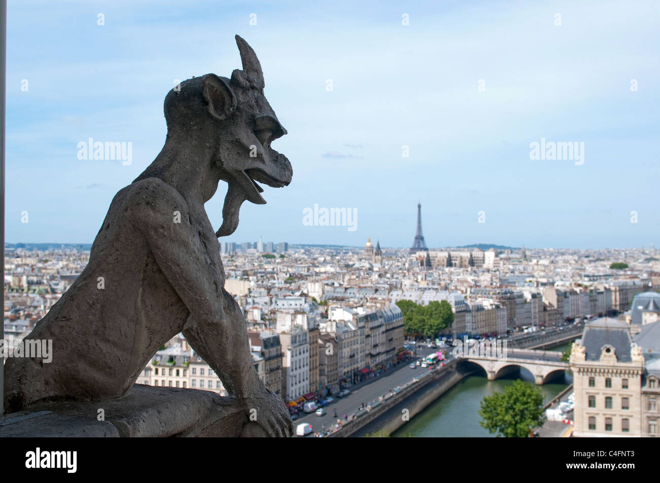 Famous Chimera (demon) overlooking the Eiffel Tower from Notre Dame of ...