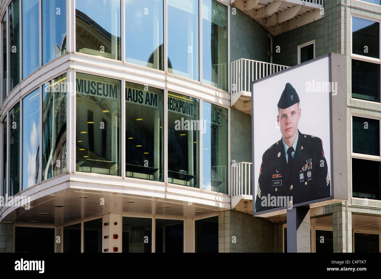 A photo showing a young american soldier at Checkpoint Charlie in ...