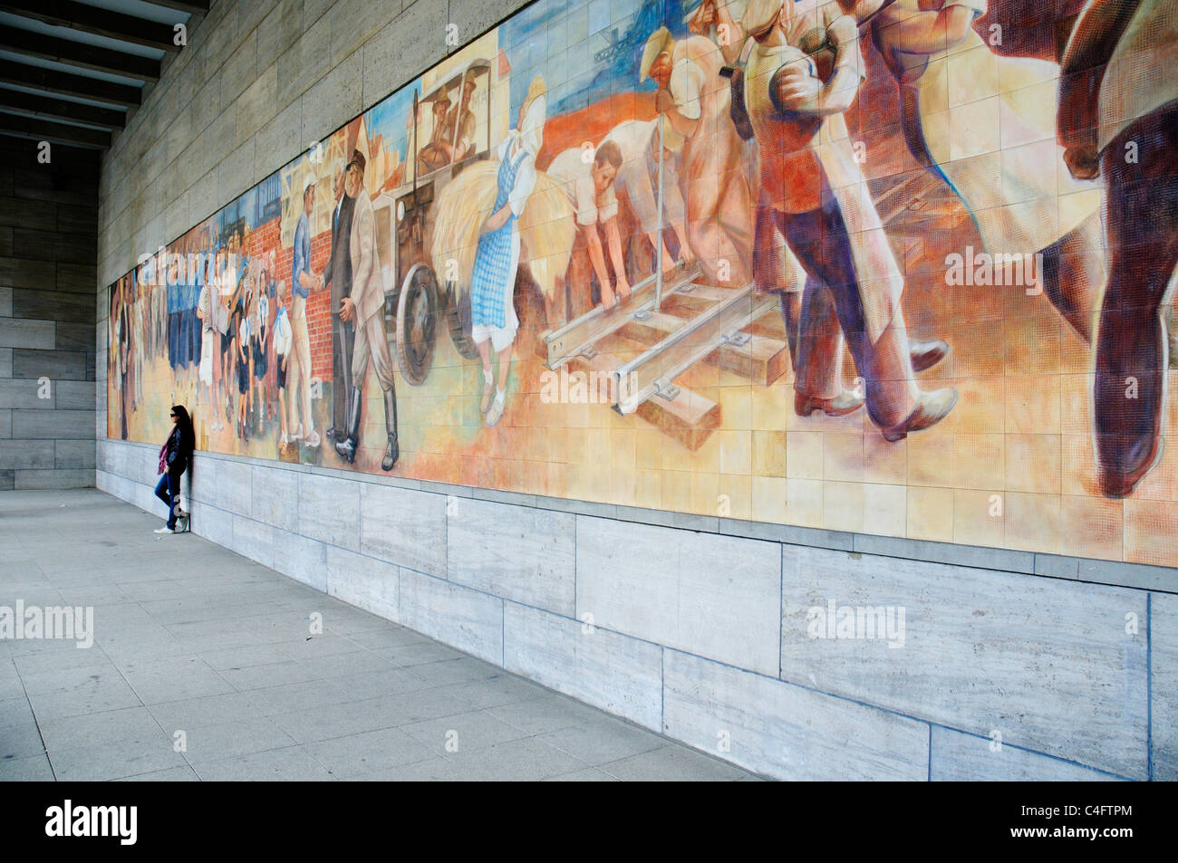 Socialist wall mural of happy workers on the wall of the Ministry of ...