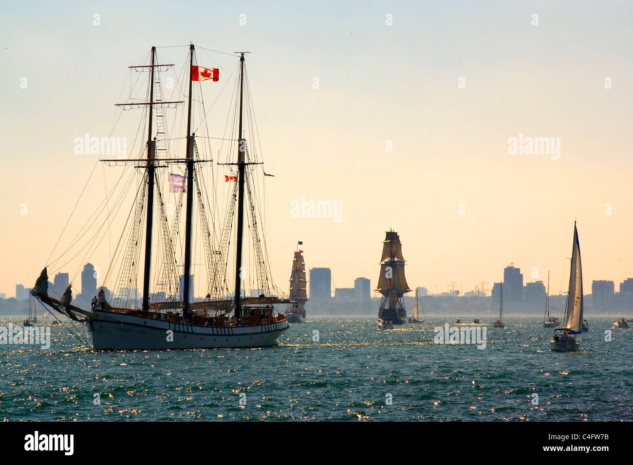 Tall Ship with Canadian Flag at Sunset Stock Photo - Alamy