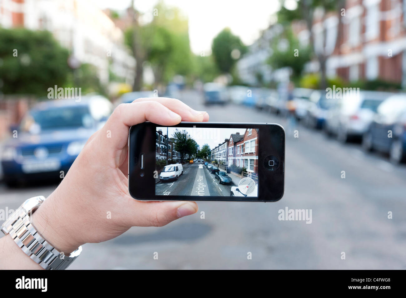 Google Street View on the screen of iPhone, London, England, UK Stock ...