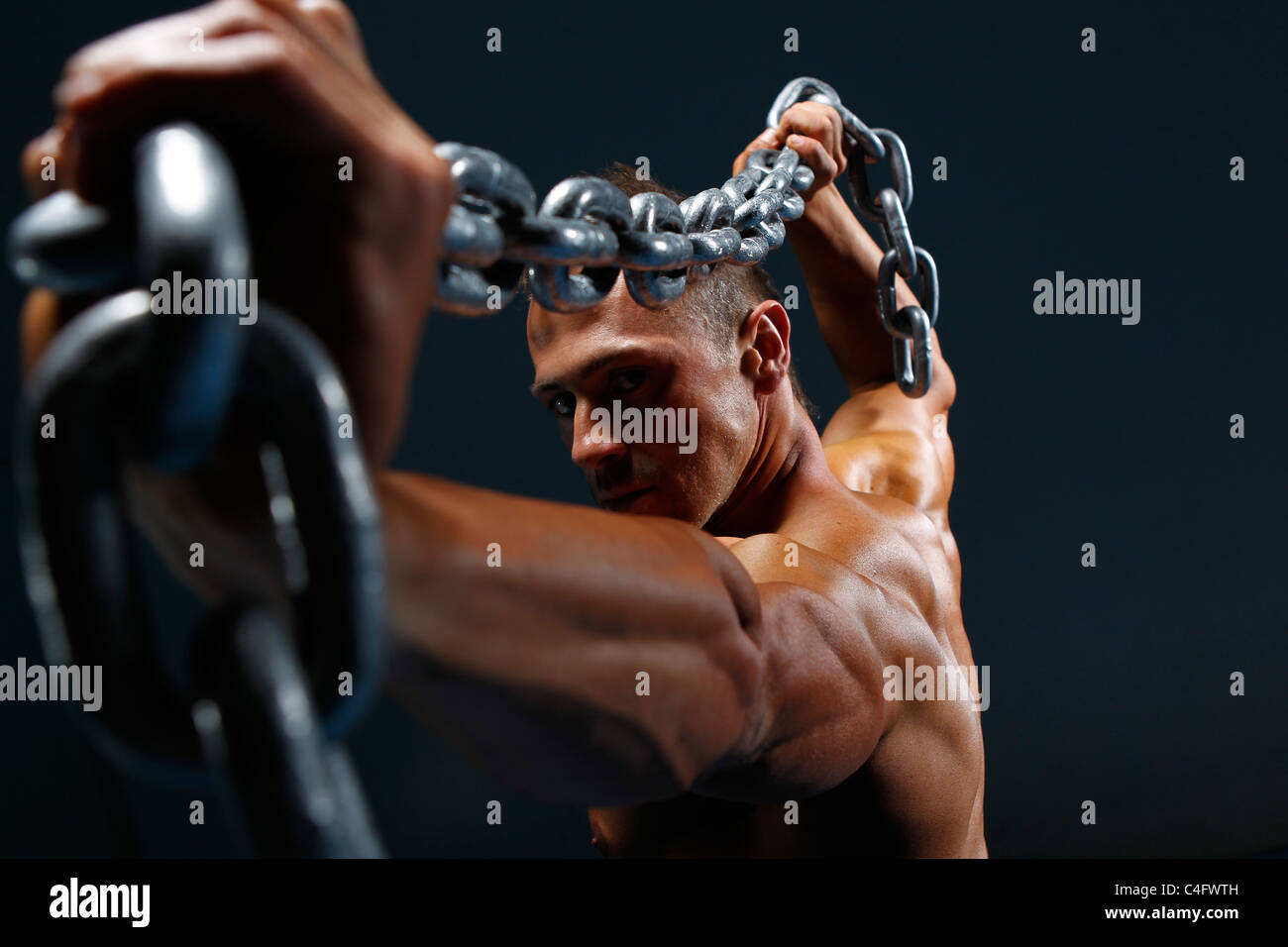 Muscle man chain hi-res stock photography and images - Alamy