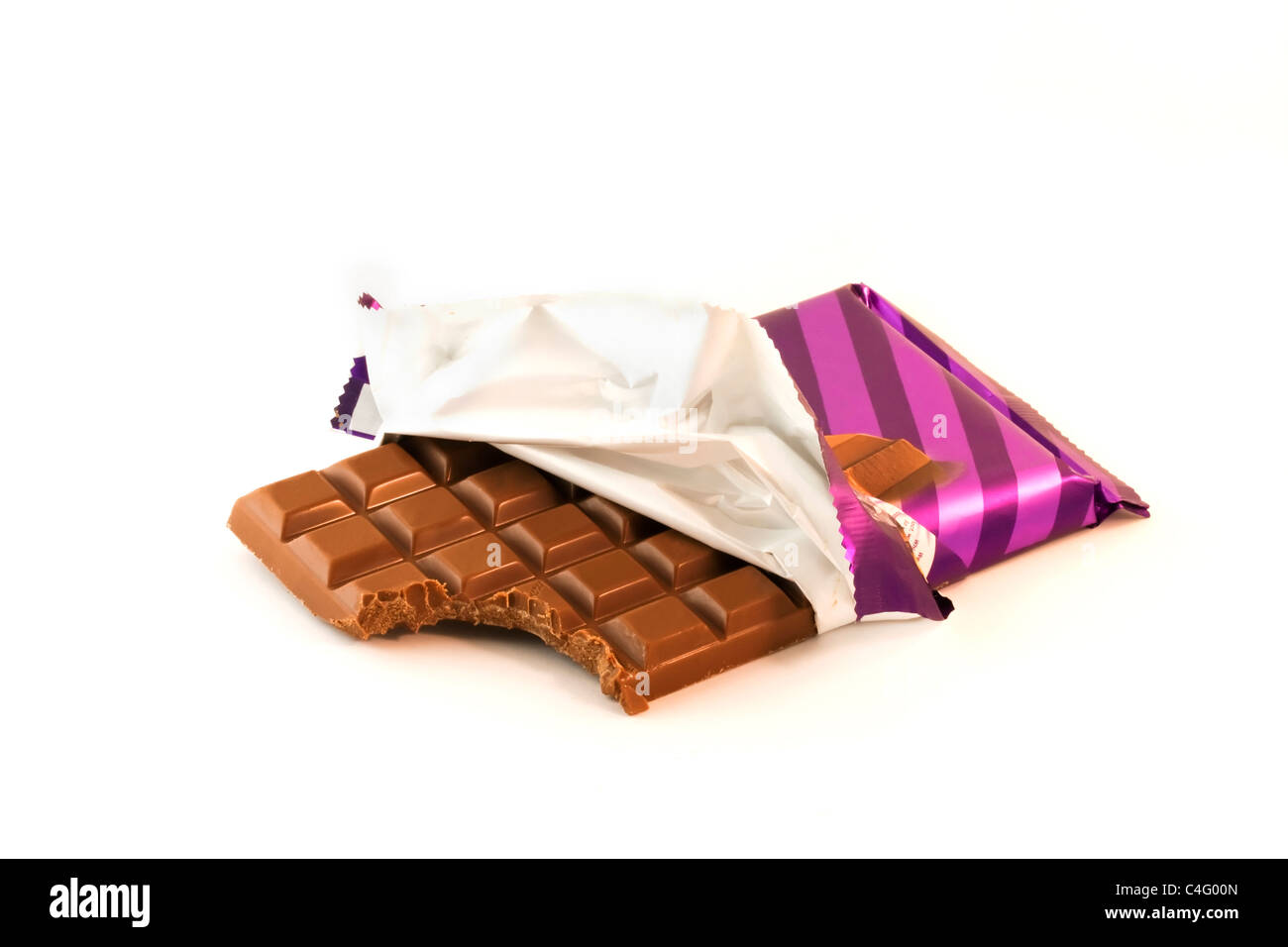 Chocolate bar isolated on white with a missing bite in the wrapper ...