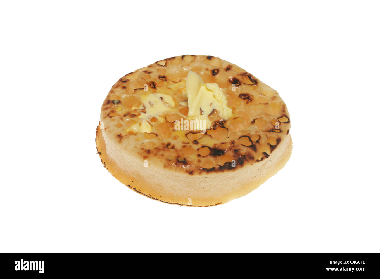 Toasted and buttered crumpet isolated on white Stock Photo - Alamy