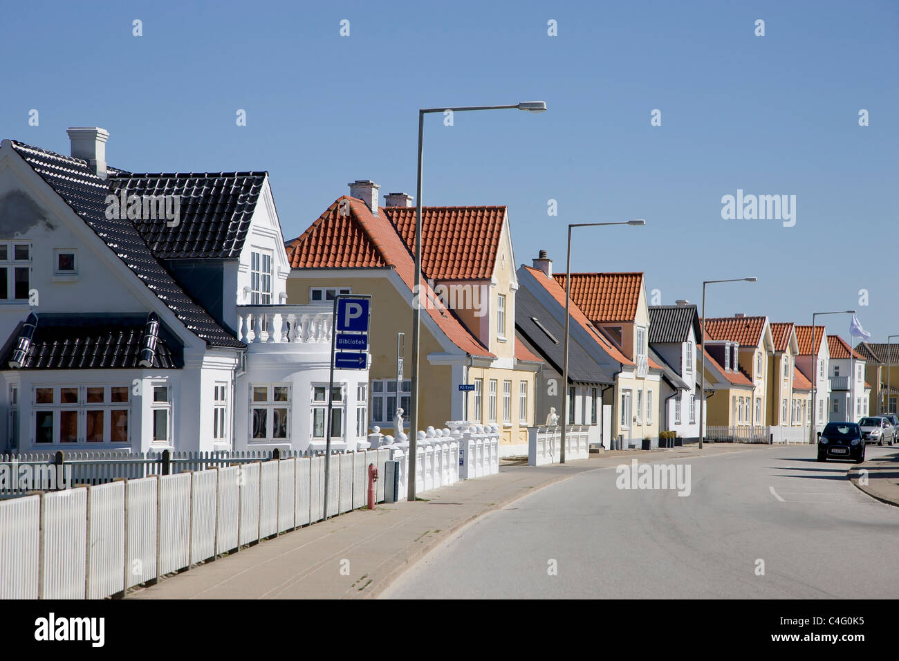 Street view at the Danish fishing village Loekken Stock Photo - Alamy