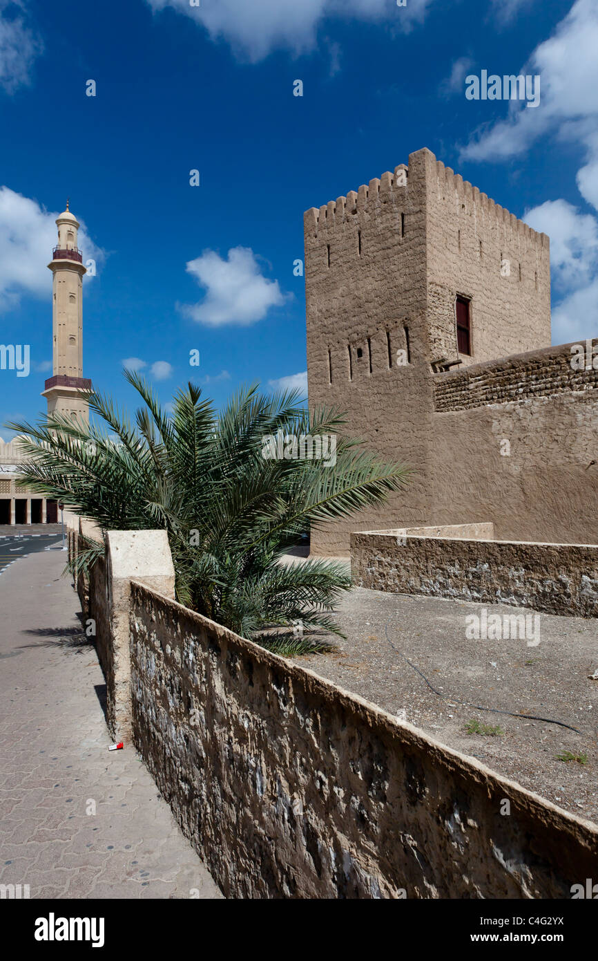 The Al Fahidi fort and museum with a mosque minaret in Dubai, UAE ...