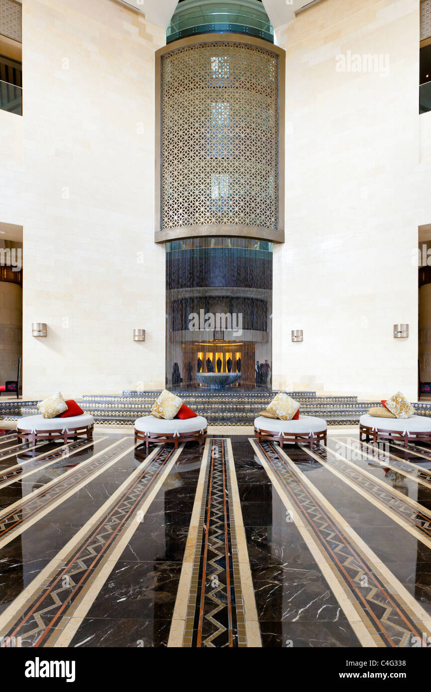 The interior entrance lobby of the Raffles Dubai Hotel in Dubai, UAE ...