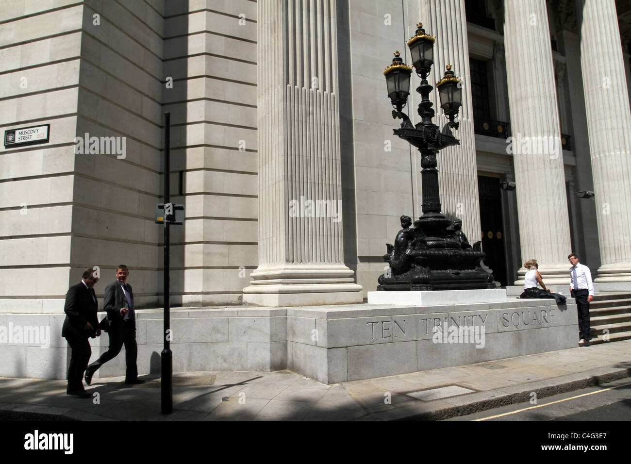Office workers having lunch break at Trinity Square in the City of ...