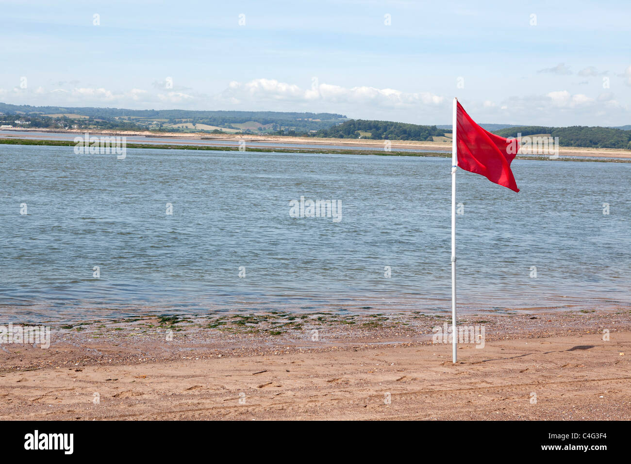swimming warning notices flag on beach near exmouth devon uk Stock ...