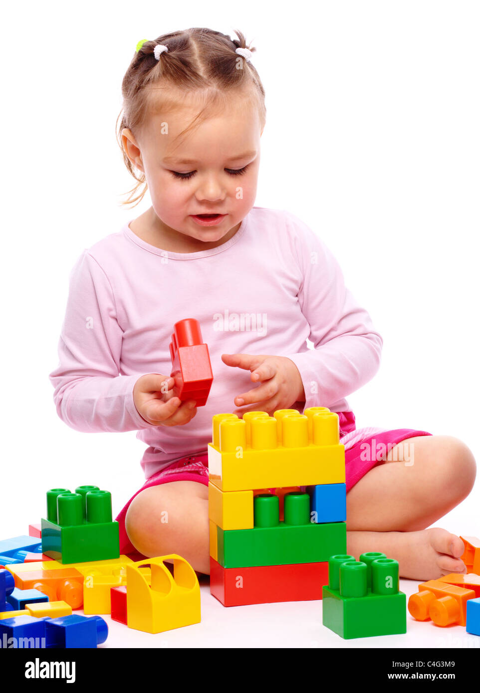 Girl building small bricks hi-res stock photography and images - Alamy