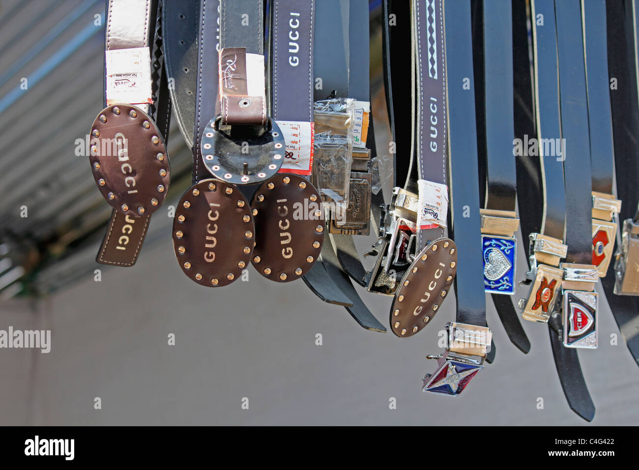 Belts on display Stand outside a shop, India Stock Photo - Alamy