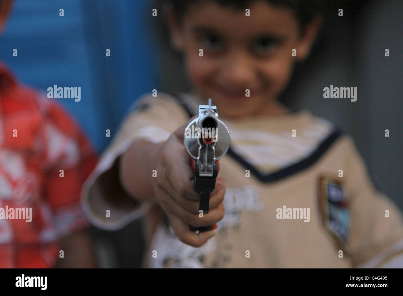 Kurdish child with gun hi-res stock photography and images - Alamy