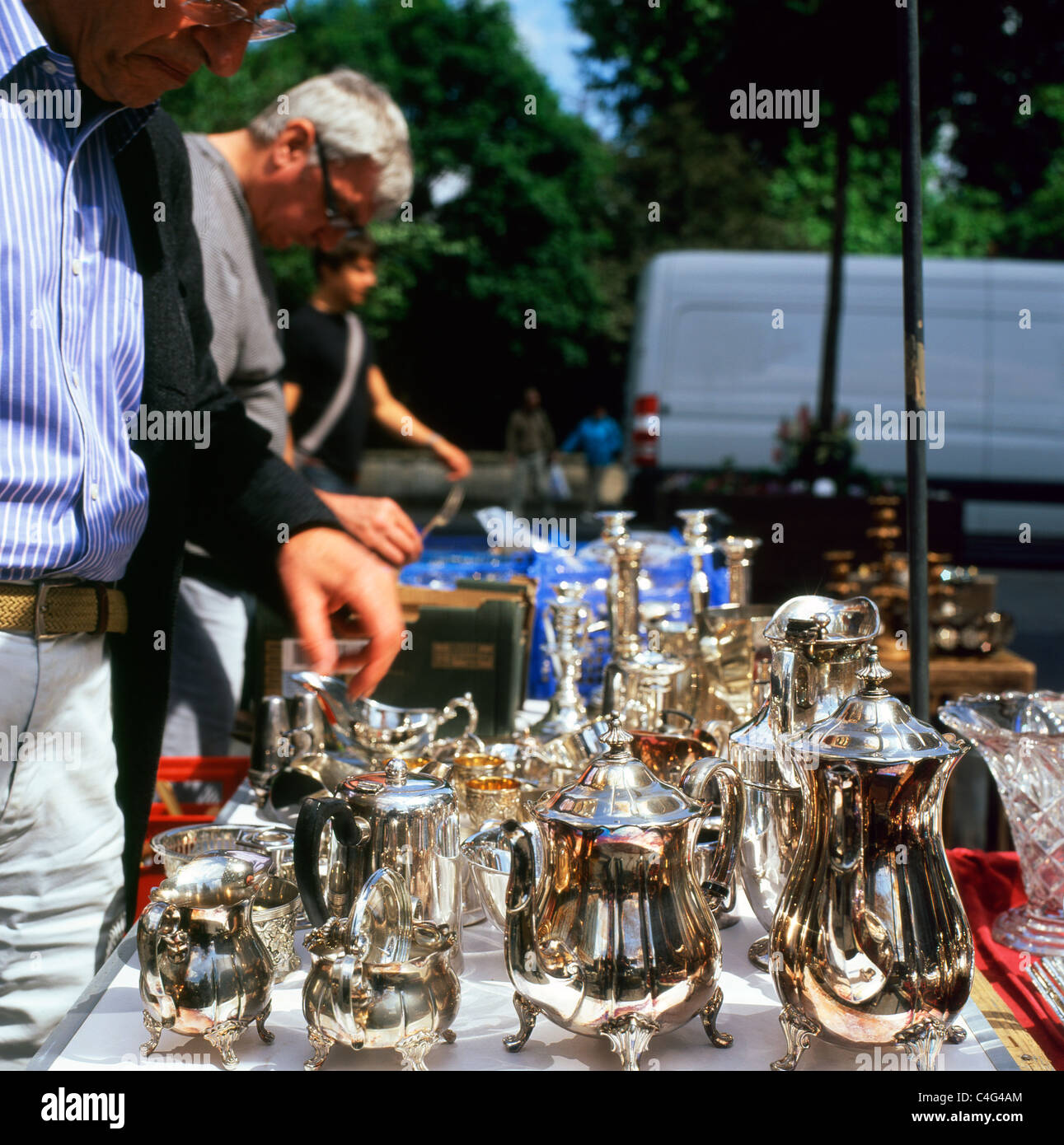 People browsing a silverware stall at Bermondsey Antiques Market Stock ...