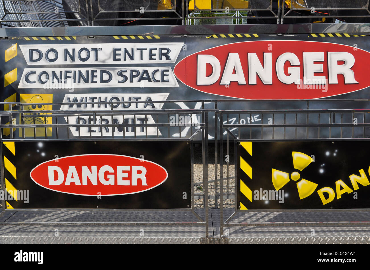 Danger signs at Amusement Park Stock Photo - Alamy