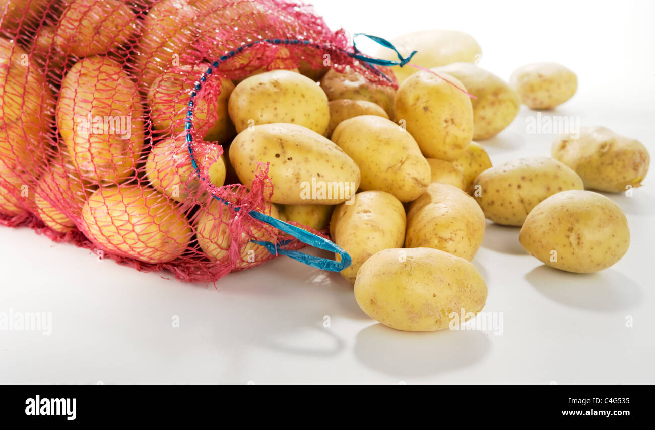 Sack of fresh potatoes on white background. Horizontal Stock Photo - Alamy