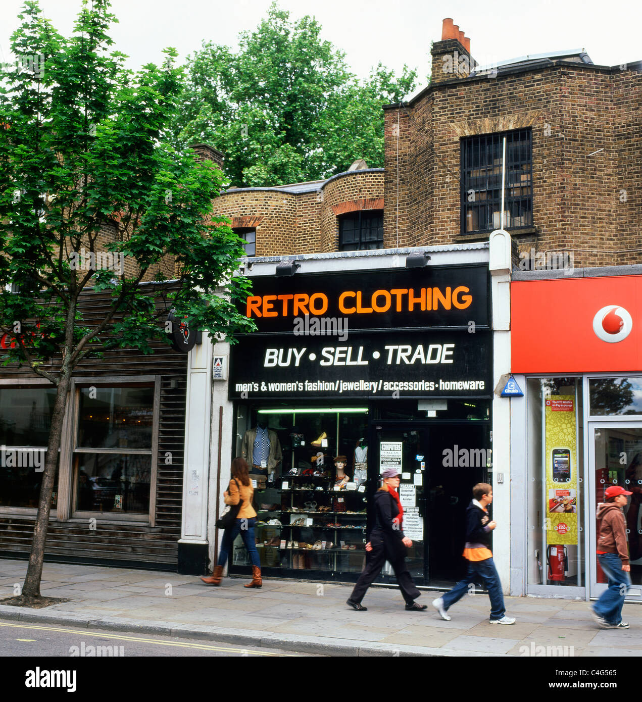 People walking past Retro Clothing Shop Notting Hill Gate West London ...
