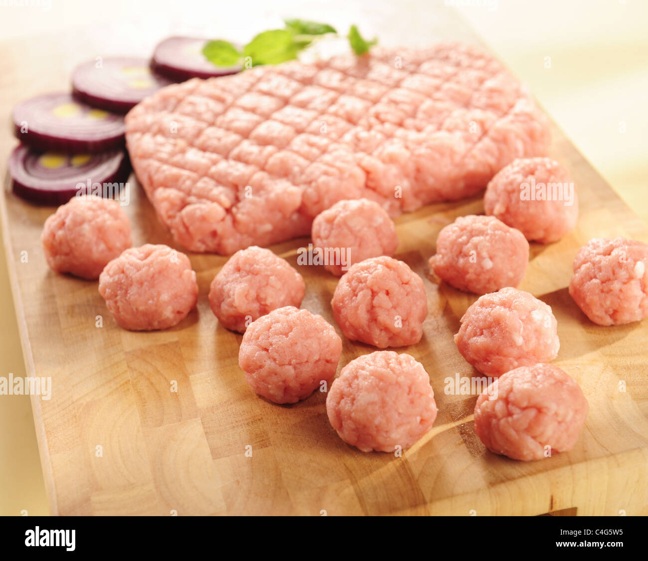 Minced ham. Meat arrangement on a cutting board Stock Photo - Alamy
