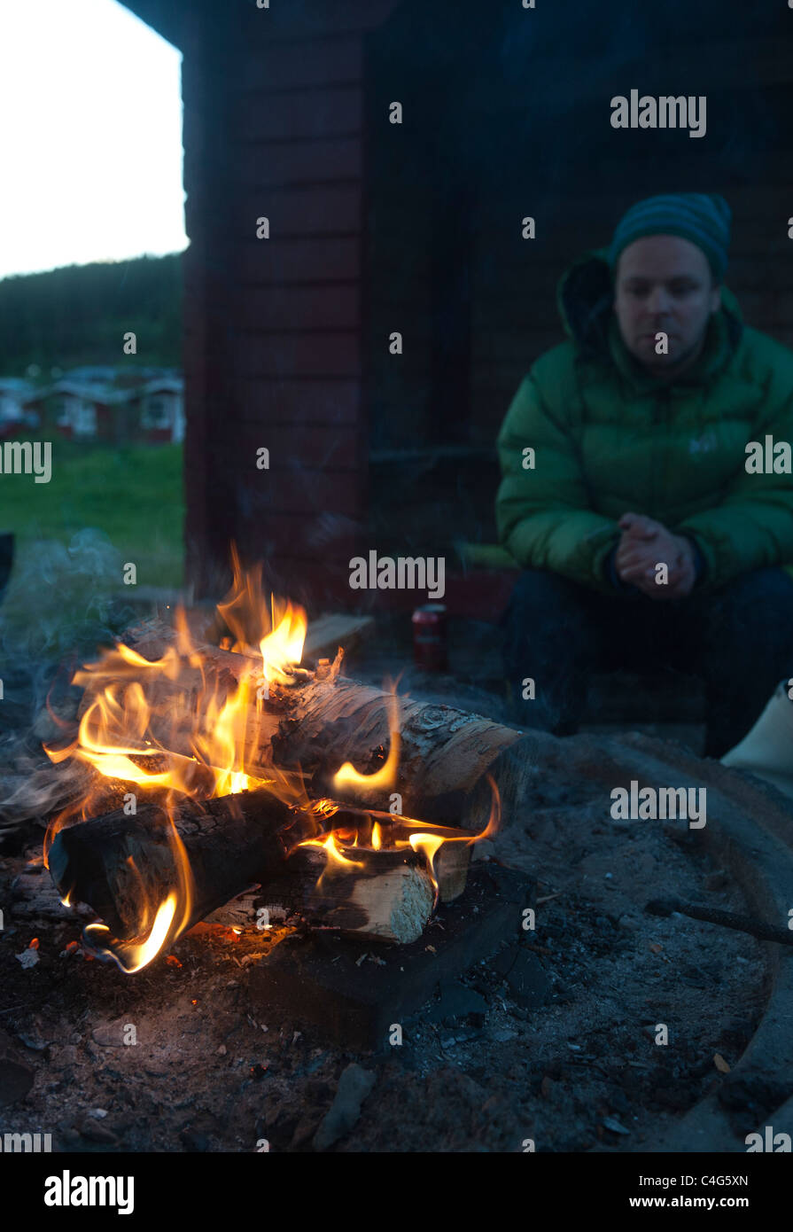 Hiker warming up fire hi-res stock photography and images - Alamy