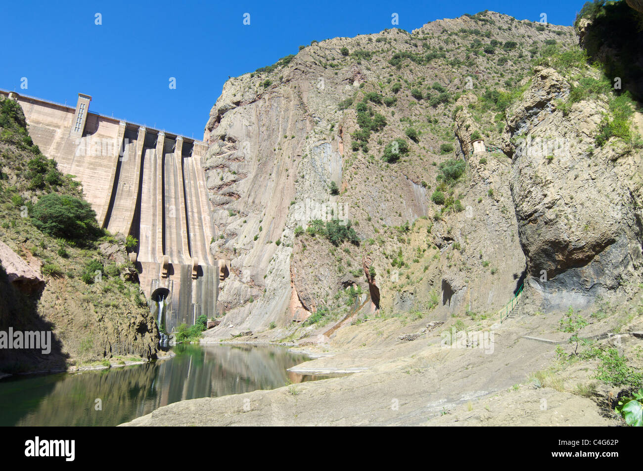 Hydroelectric dam with blue sky in Spain Stock Photo - Alamy