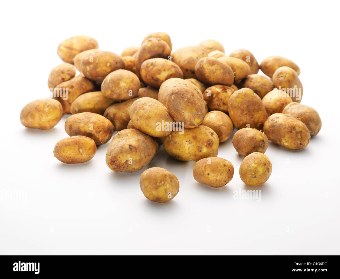 Group of fresh new potatoes isolated on white background Stock Photo ...