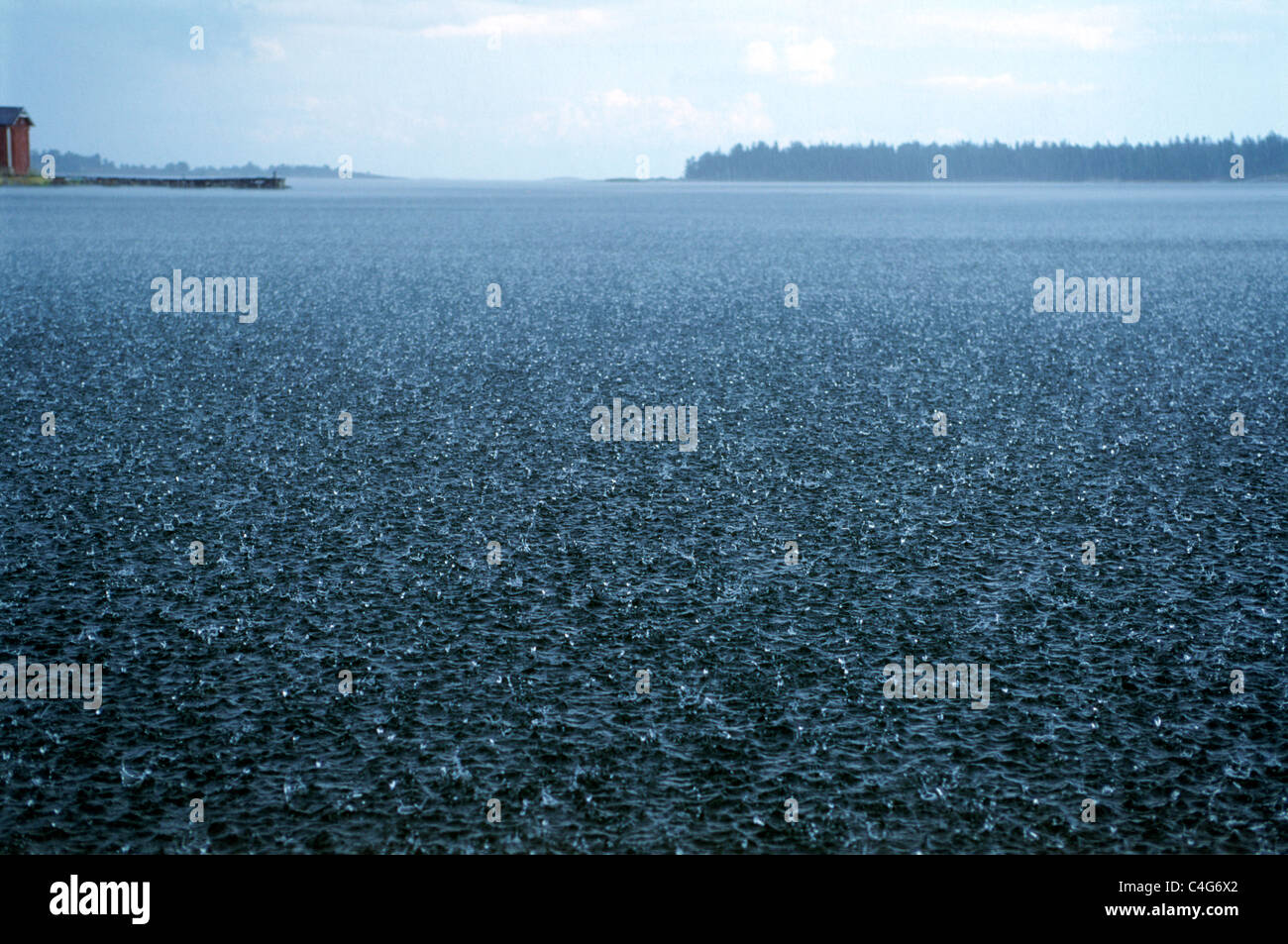 Heavy raindrops hitting surface of Baltic Sea in Sweden Archipelago ...