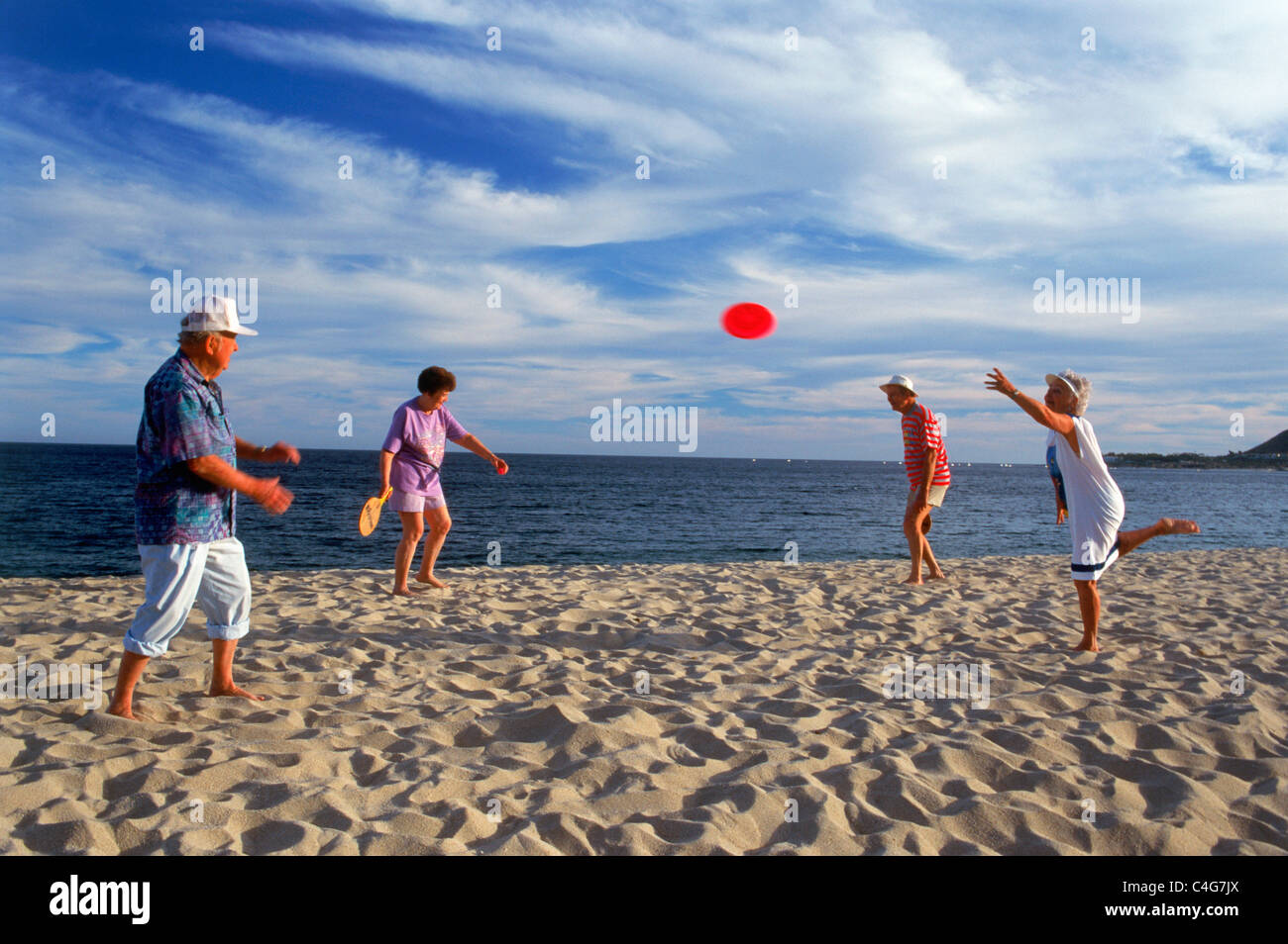 Beach frisbee woman hi-res stock photography and images - Alamy