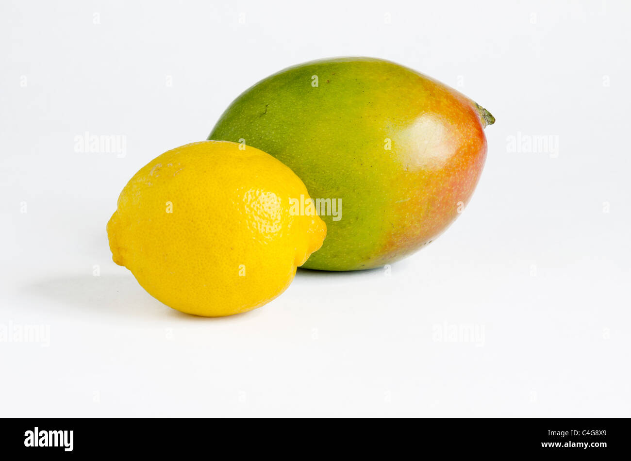 Colorful mango and yellow lemon isolated on a white background Stock ...