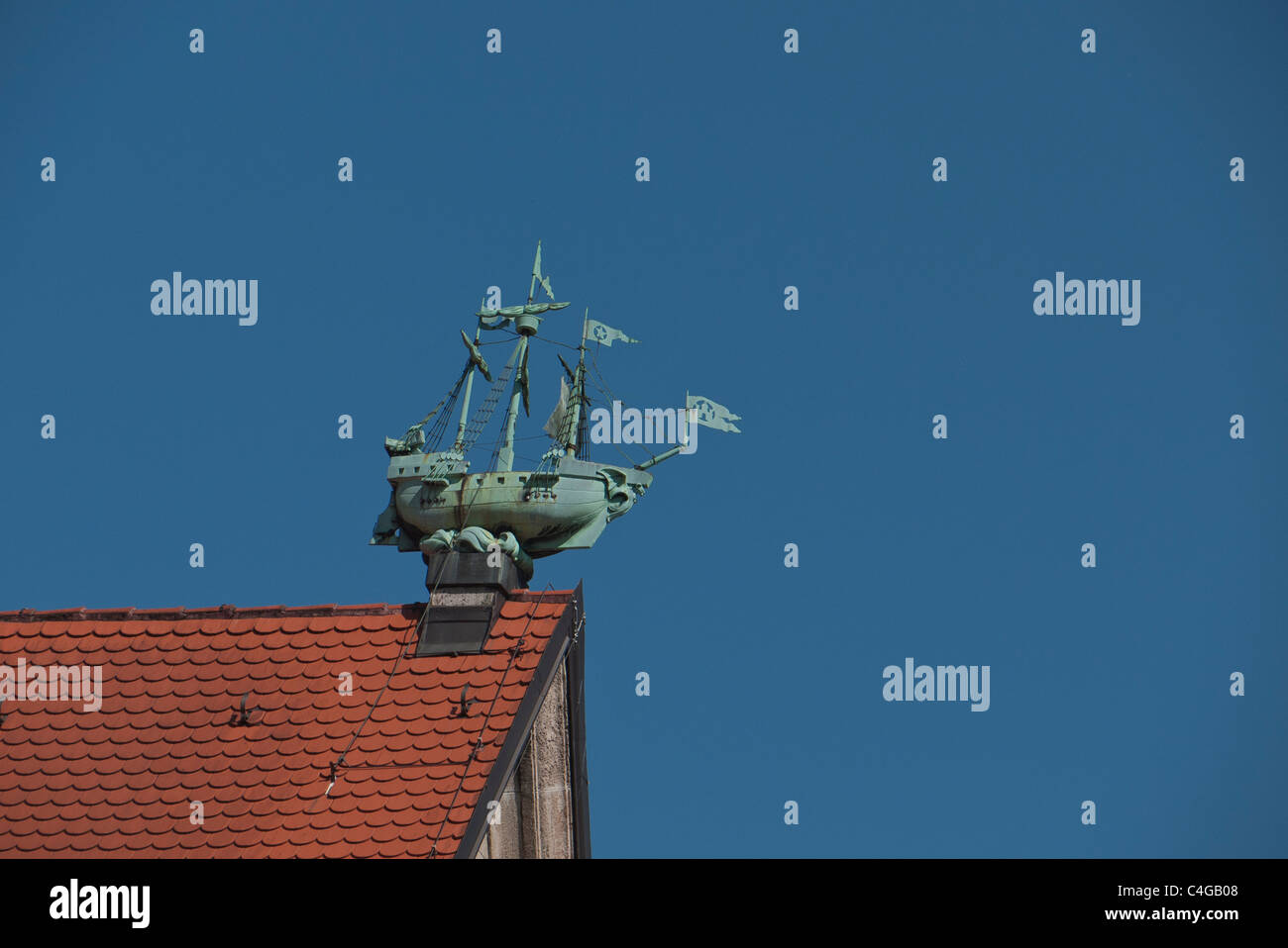 Old copper weathervane in the form of a three masted sailing ship of ...