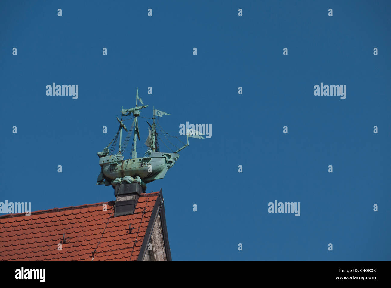 Old copper weathervane in the form of a three masted sailing ship of ...