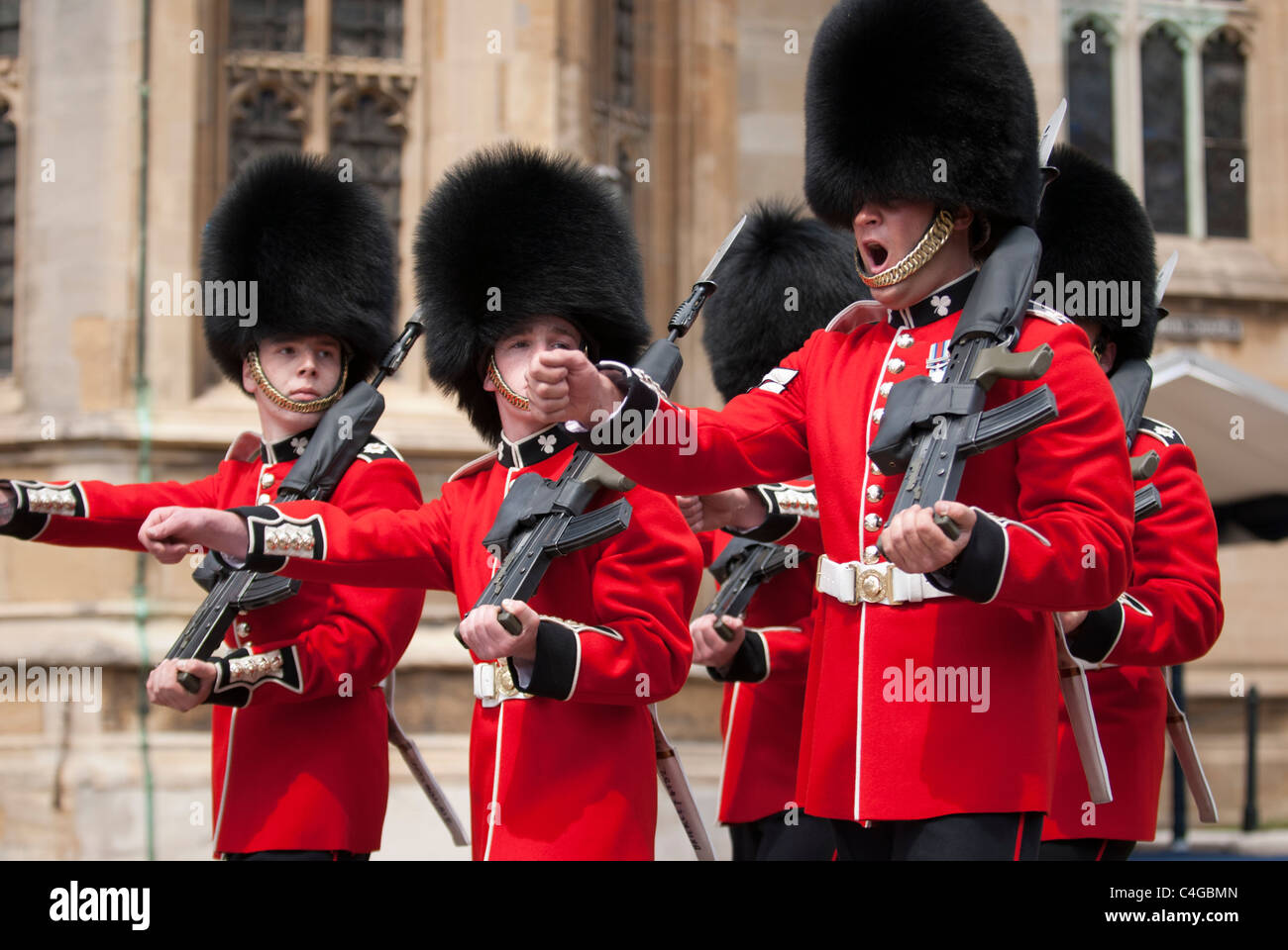 Soldiers marching in a procession ahead of The Queen to attend the ...