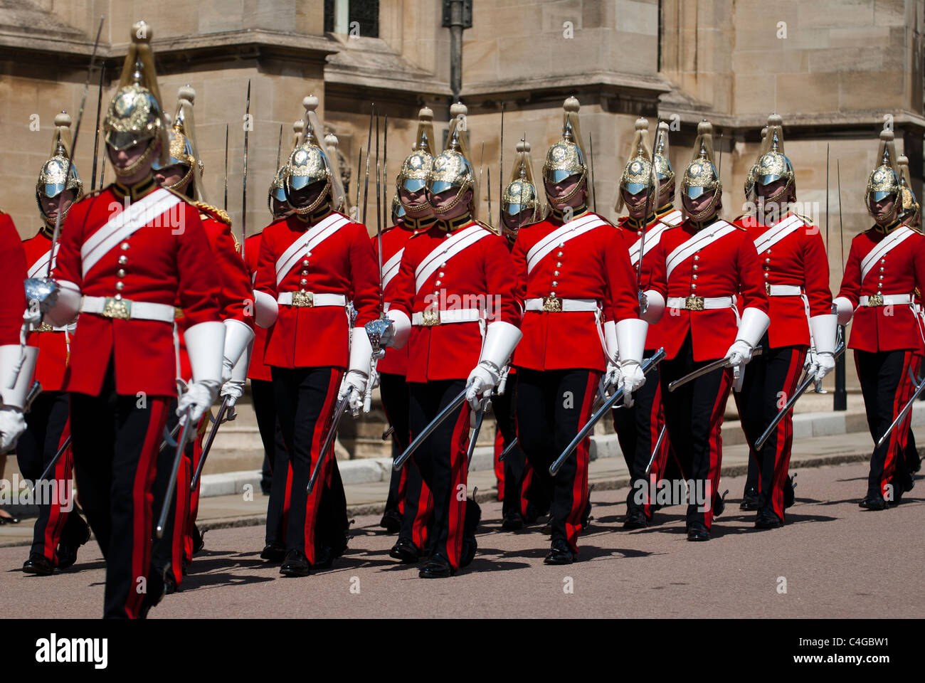Soldiers marching in a procession ahead of The Queen during The Most ...