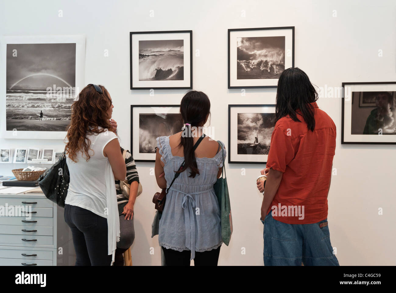Group viewing the Ed Freeman Photography Gallery opening of his new ...