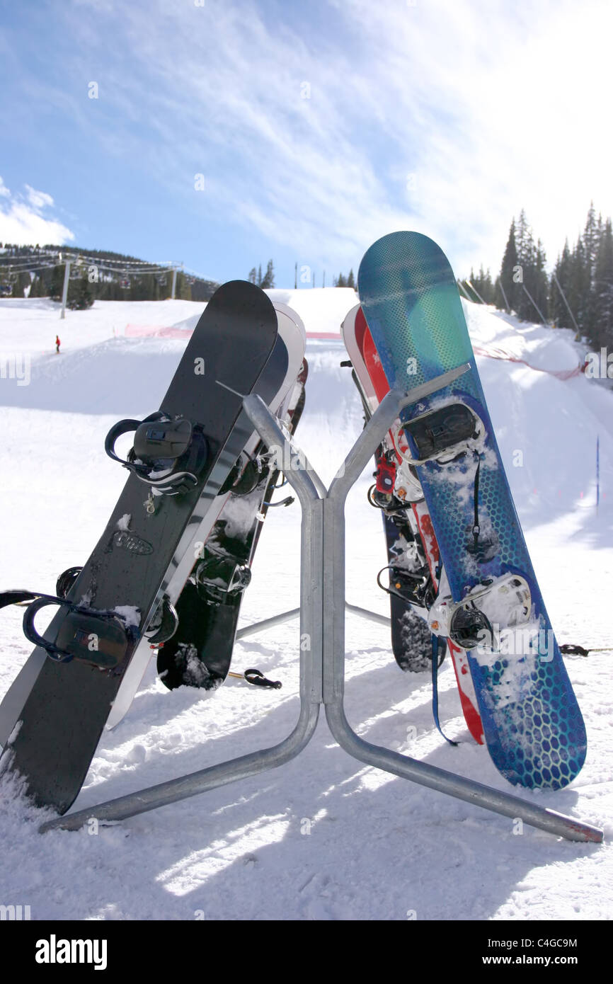Snow boards on a rack at a ski resort Stock Photo - Alamy