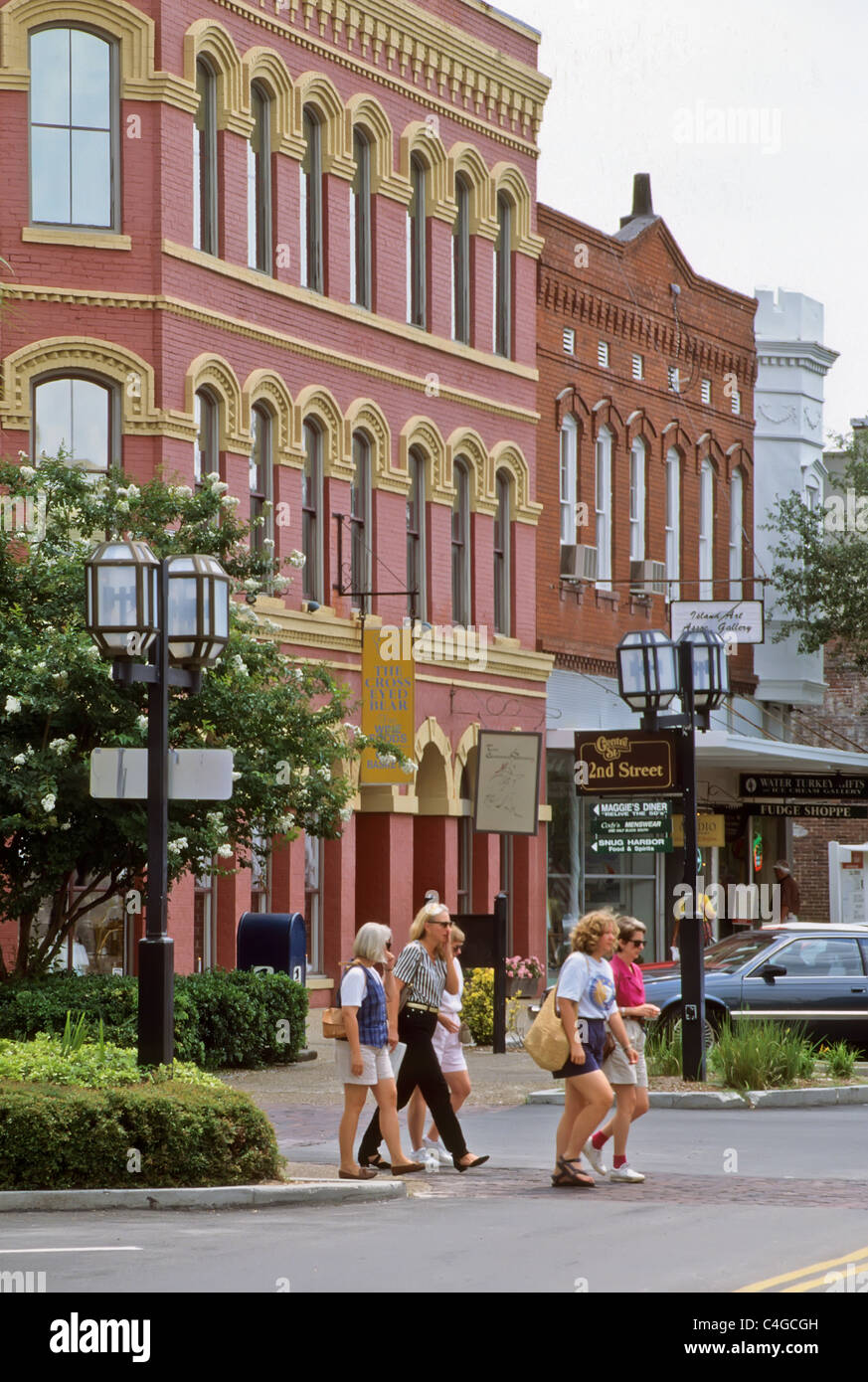 People crossing street on Centre Street in historic downtown Fernandina ...