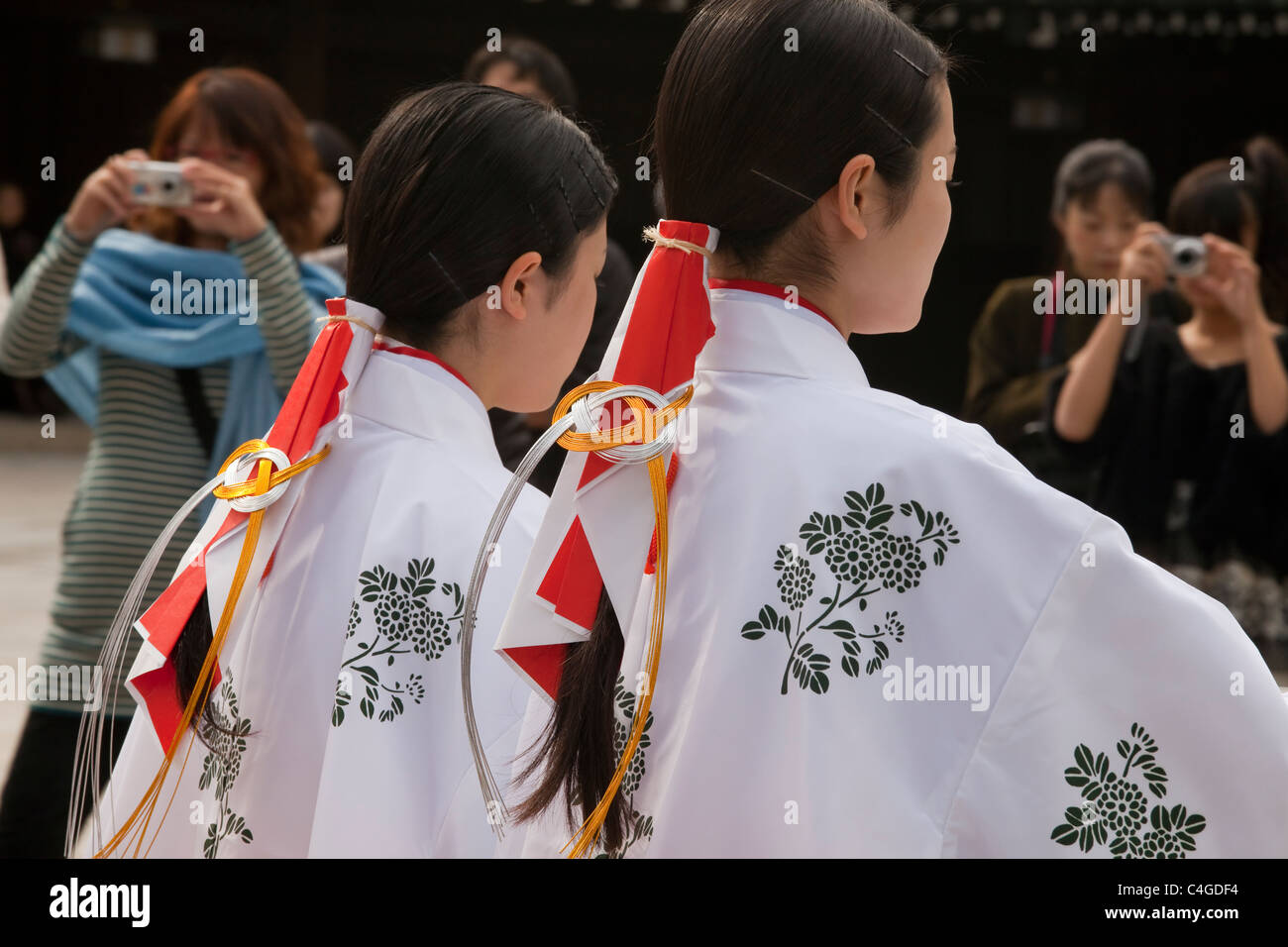 Miko, female shrine assistants at Meiji-jingu during Shinto wedding ...