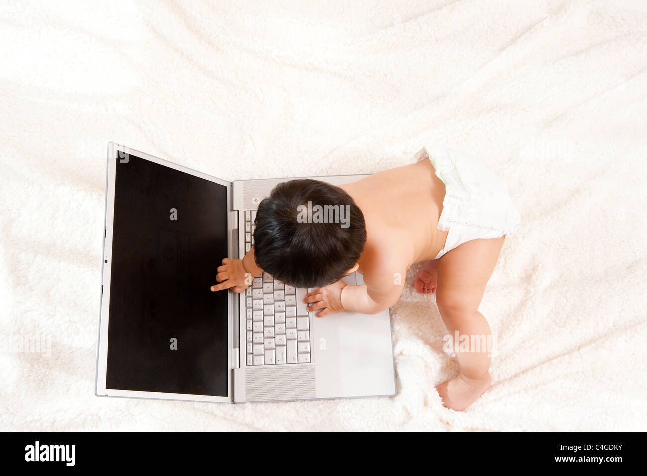 Baby "Using" a Computer Stock Photo - Alamy