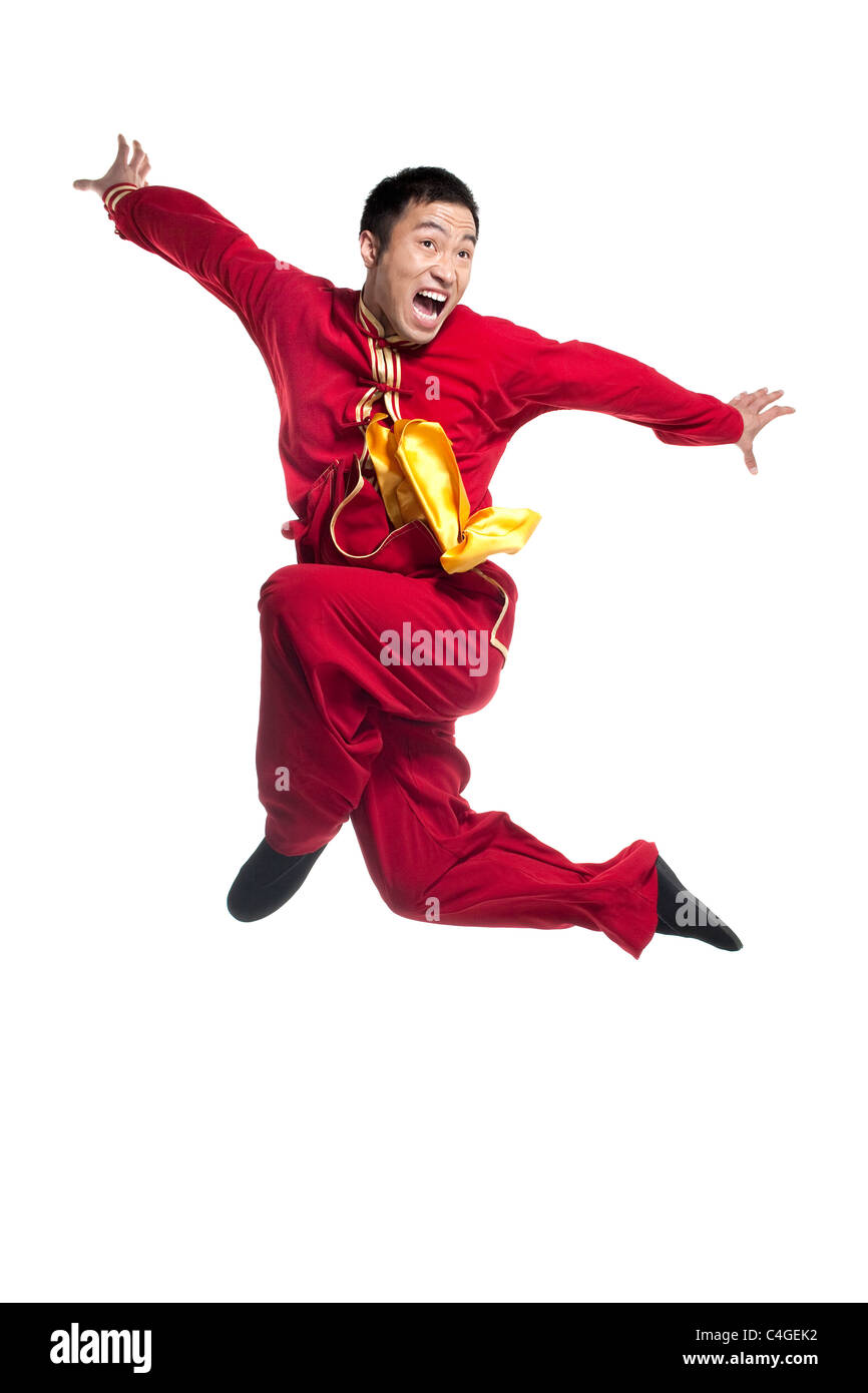Man in Traditonal Chinese Clothes Jumping in the Air Stock Photo - Alamy