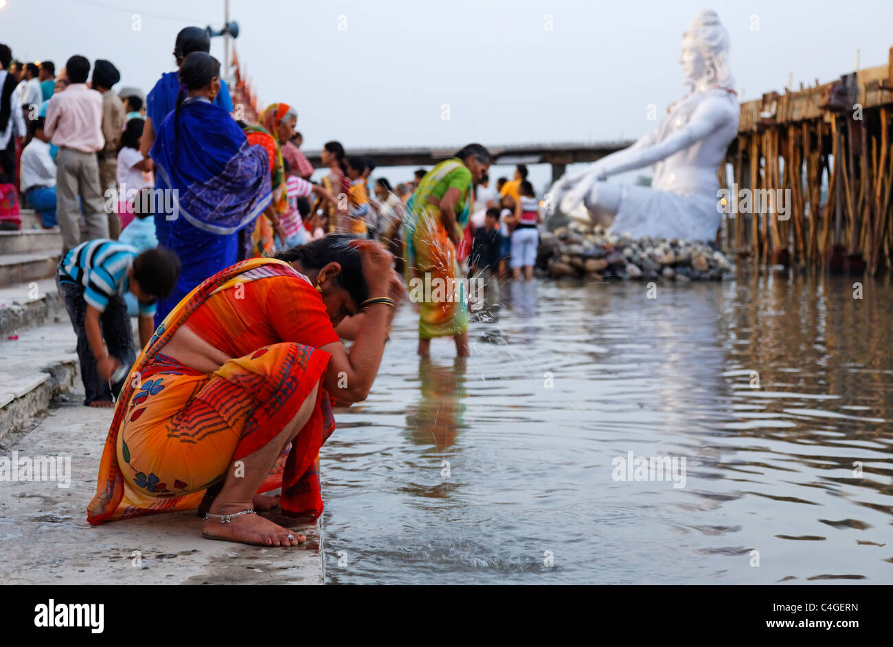 India - Uttaranchal - Rishikesh - Woman washing in the River Ganges ...