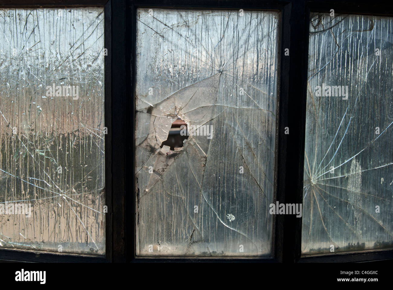 BROKEN WINDOW GLASS Stock Photo - Alamy