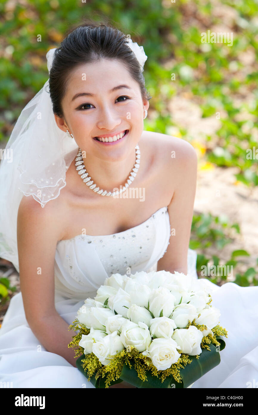 Happy Bride Sitting Stock Photo - Alamy