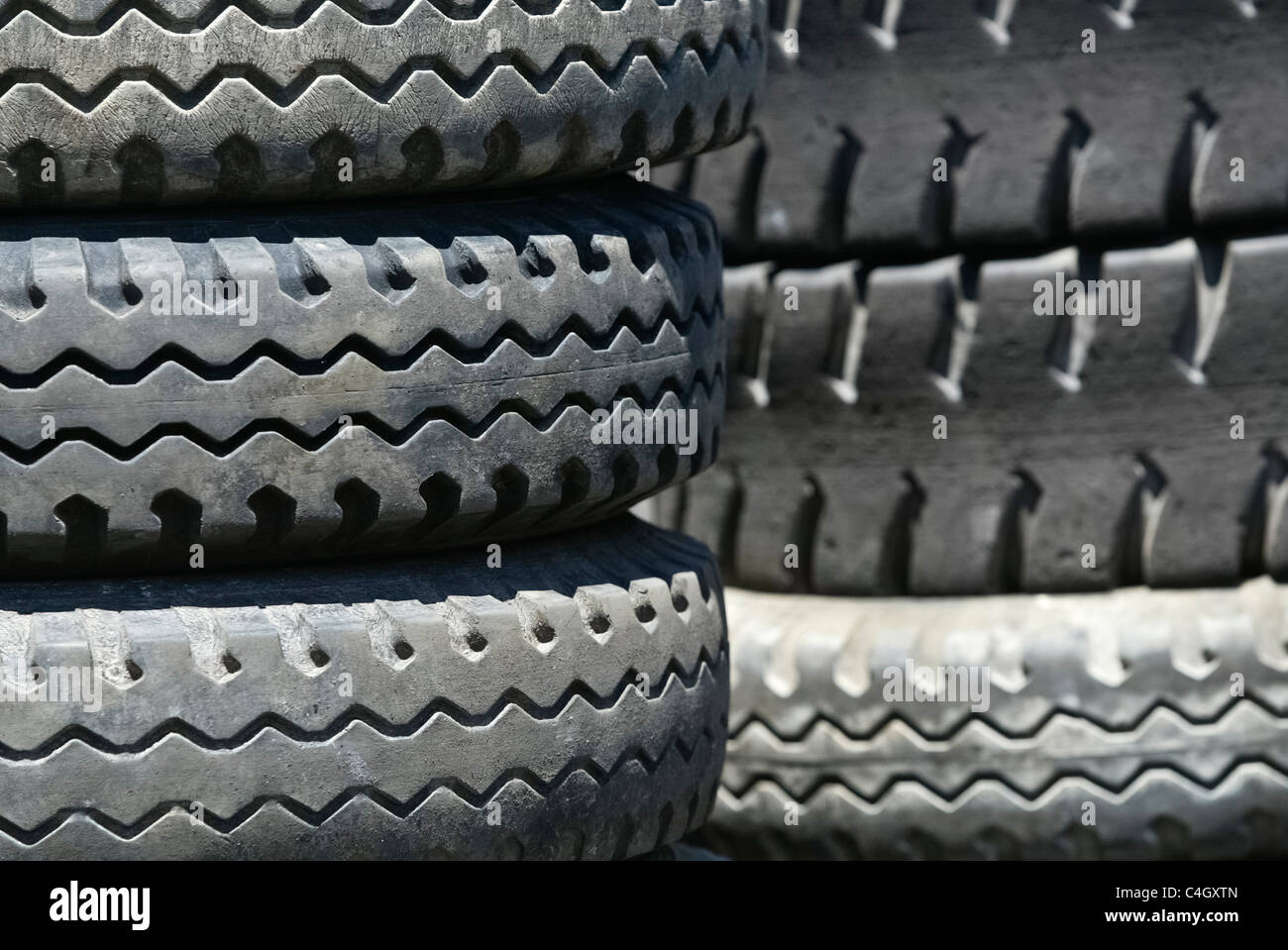 Pile of stacked car tyres Stock Photo - Alamy