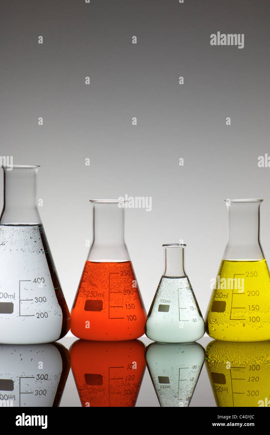 group of beakers with a white background Stock Photo - Alamy