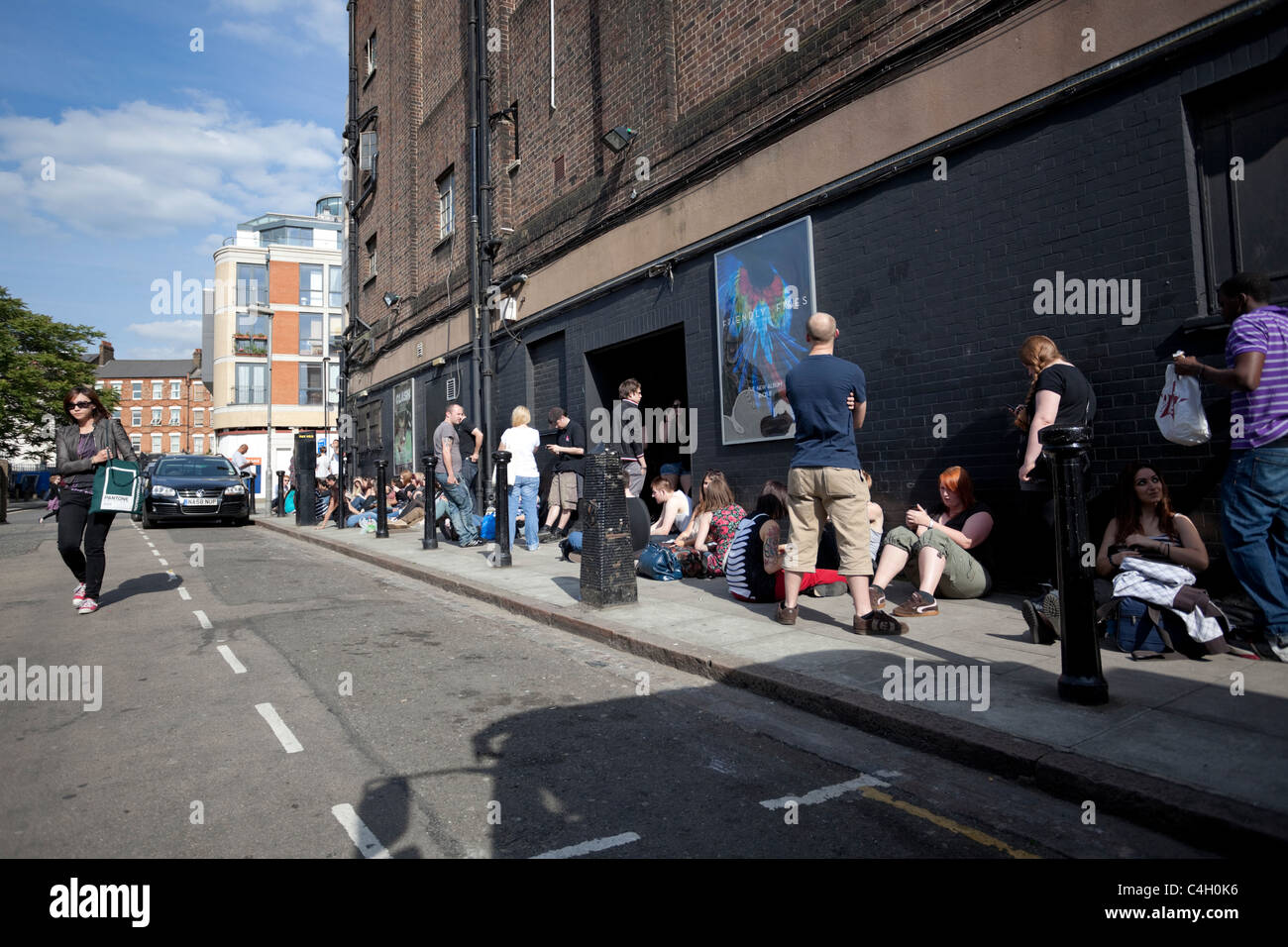 People queuing on the pavement, Camden, London, England, UK Stock Photo ...