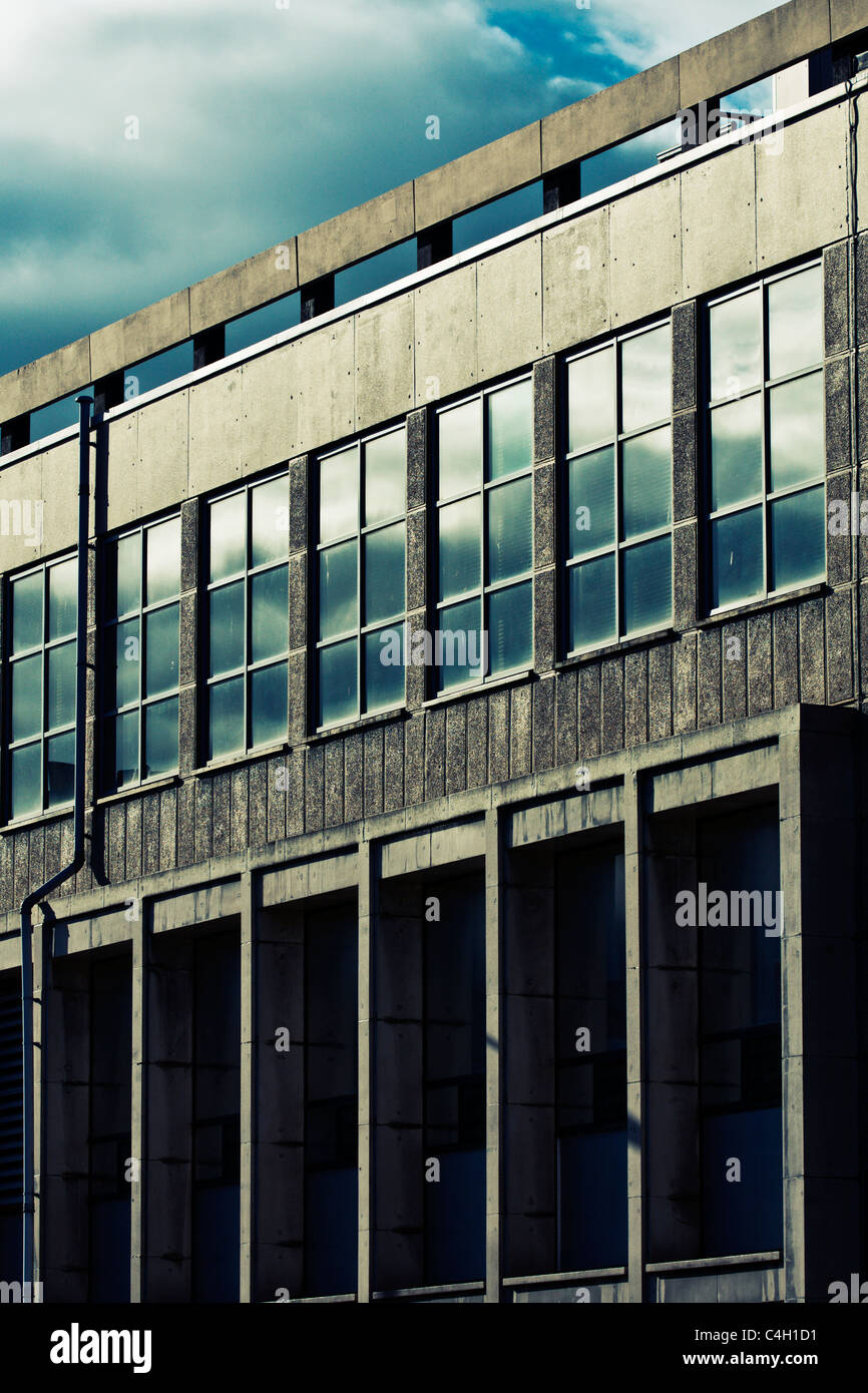 Close-up on industrial, modern building. Glass, concrete and sky Stock ...