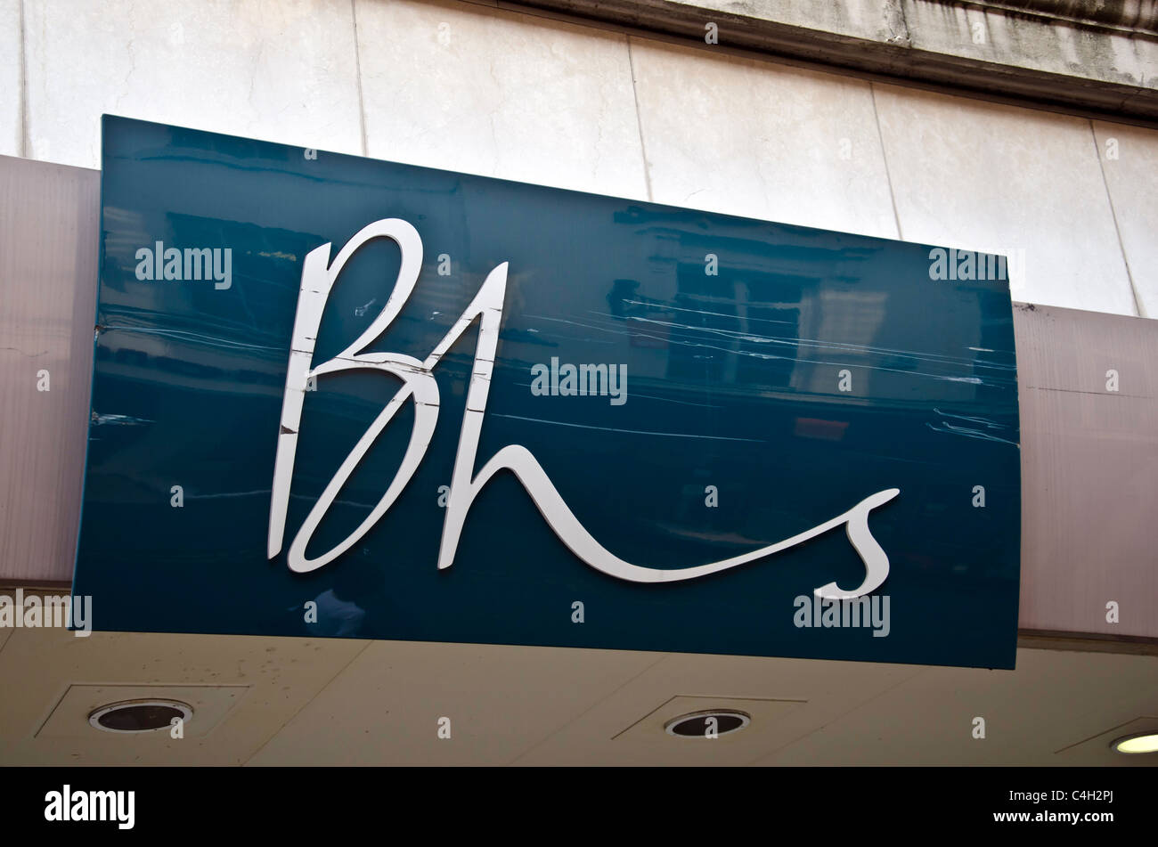 BHS store sign scraped by vehicles in a narrow lane in York City Centre ...