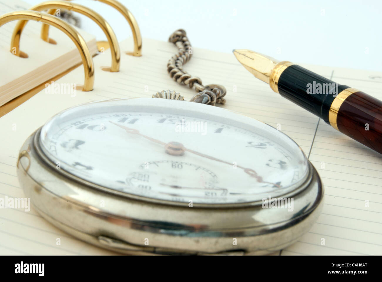 Pocket Watch and Ink Pen Stock Photo - Alamy