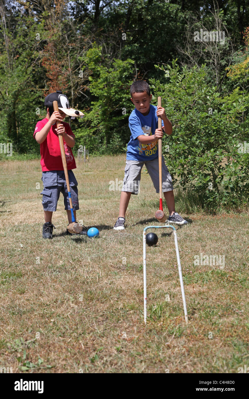 Children playing croquet hi-res stock photography and images - Alamy